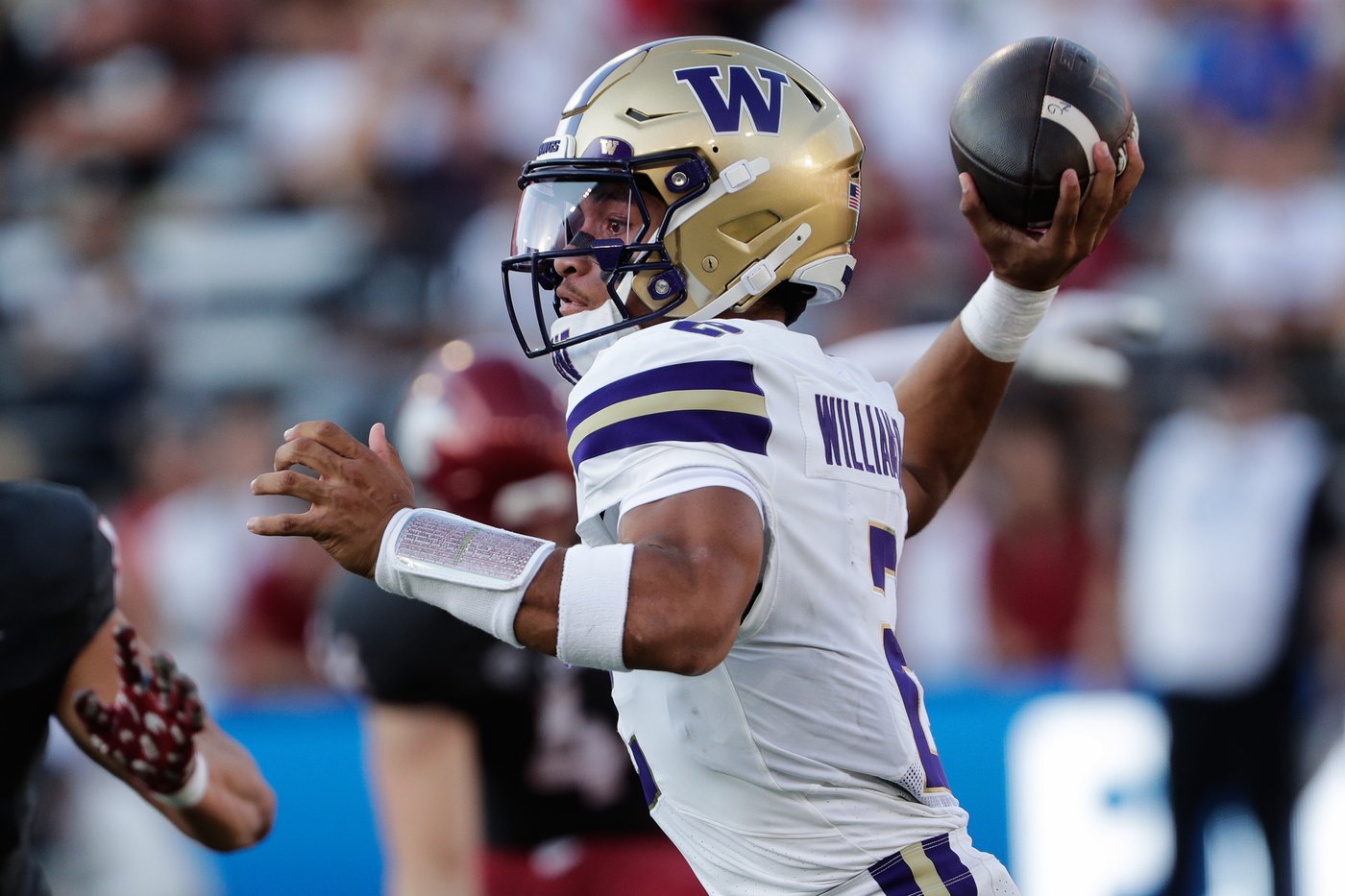 Demond Williams Jr. leads Washington over Washington State 59-24 in Apple Cup
