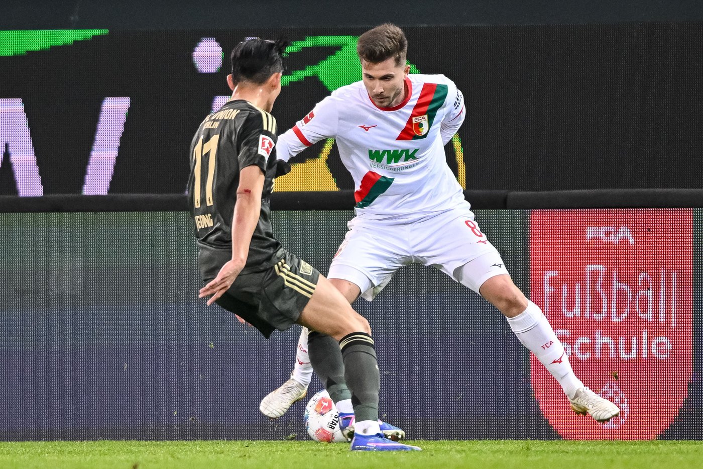 Fan protest against kickoff times interrupts Bundesliga game between ...