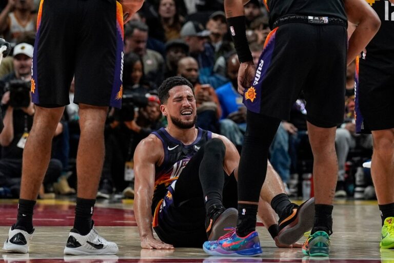 Suns All-Star guard Devin Booker to miss at least a week with sprained ...